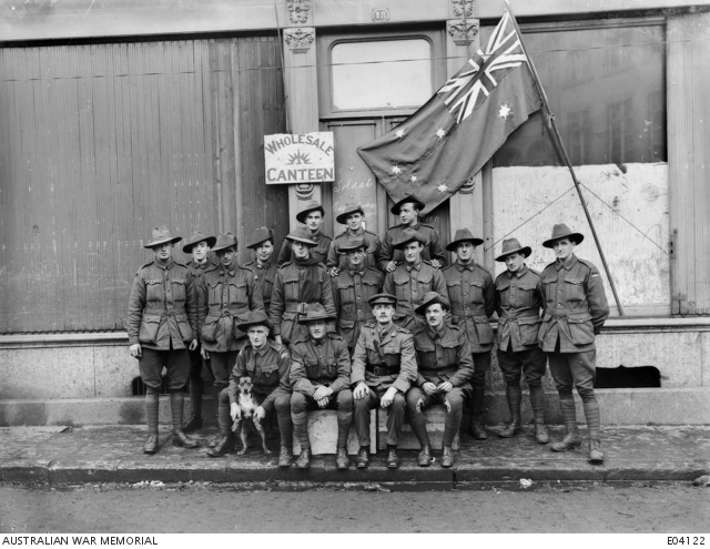 An outdoors group portrait of unidentified members of the staff of the ...