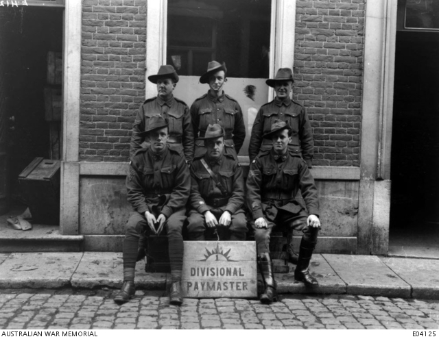 An outdoors group portrait of unidentified members of the Staff of the ...
