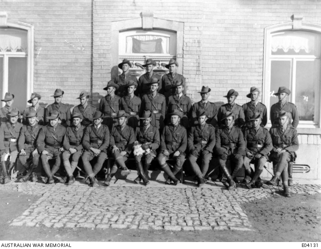 An outdoors group portrait of the Commanding Officer Lieutenant Colonel ...