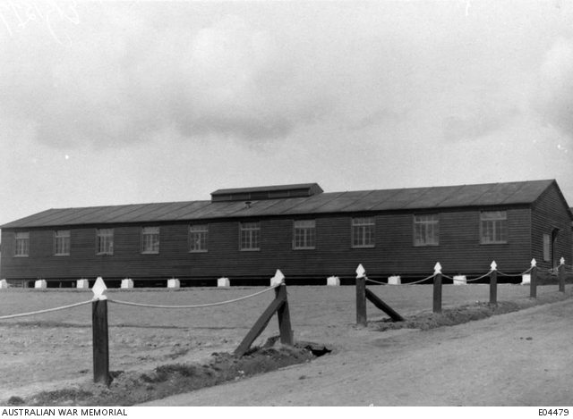 An exterior view of the men's mess hut and part of the parade ground at ...