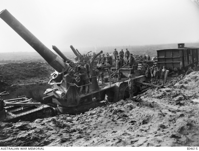Unidentified soldiers, probably British, grouped around two 12 inch ...