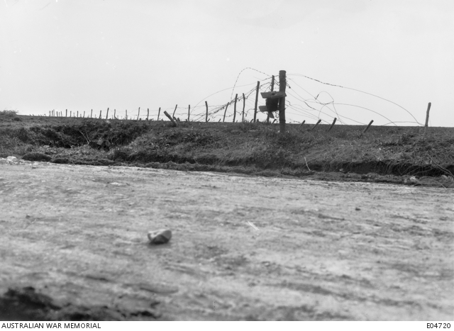 A view of the apron type barbed wire entanglements that were erected ...