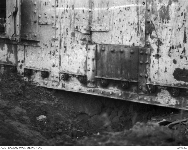 A close up view of a damaged Mark V* Female tank on the battlefield ...