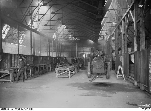 A group of unidentified students at work in the fitters' workshop at ...