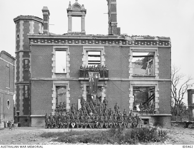 An outdoors group portrait of unidentified members of No 5 Company of ...