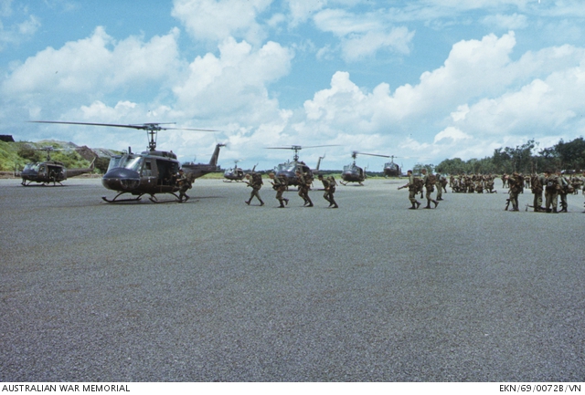 South Vietnam. c. 18 August 1969. A line of Iroquois helicopters move ...