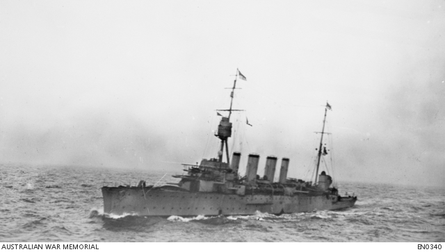 HMAS Melbourne flying three battle flags and cleared for action on the ...