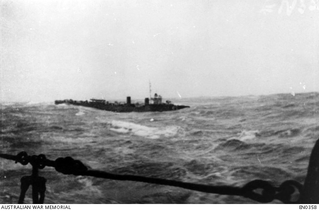 HMAS Yarra makes her way through heavy seas off the French coast en ...