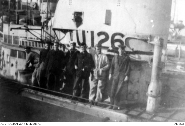 Group portrait of unidentified crew members from HMAS Swan on board the ...