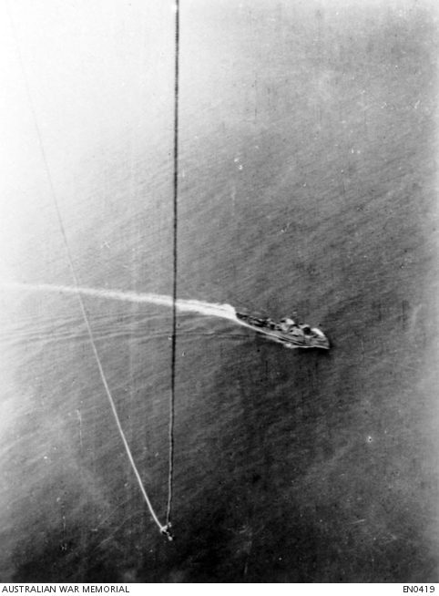 HMAS Warrego as seen from an observation balloon moored to one of the ...