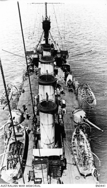 A view of the decks of HMAS Melbourne from the main topmast, showing ...