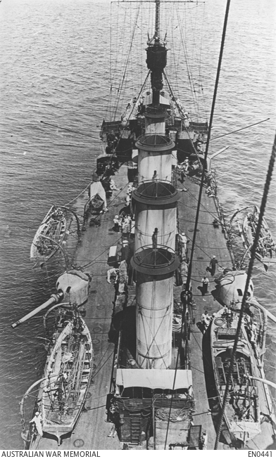 A view of the decks of HMAS Melbourne from the main topmast, showing ...