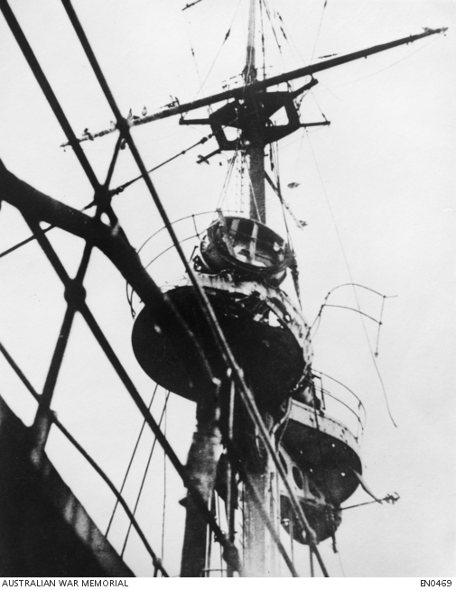 The smashed mainmast and searchlight platform of the German cruiser ...