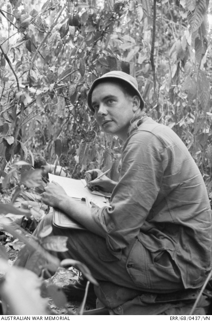 Phuoc Tuy Province, South Vietnam. 1968-04. Studying a map of the area ...