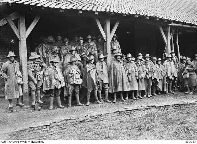 Group portrait of unidentified Australian soldiers in a rest area. They ...