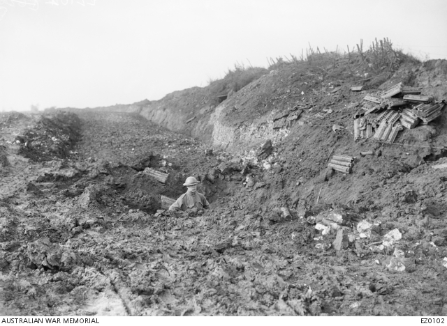 A German shell hole in the road from Casualty Corner past the Chalk Pit ...