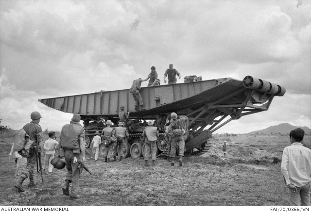 PHUOC TUY PROVINCE, SOUTH VIETNAM. 1970-06. AUSTRALIAN SOLDIERS CLIMB ...