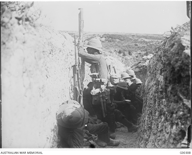 In the trenches, a British soldier (King's Own Scottish Borderers) with ...