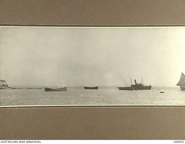 At Sea, Turkey. July 1915. Kum Kale (behind the tug) and Trojan Plain ...