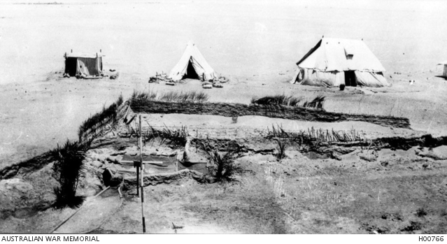 An artesian well supplying water for a field artillery camp in the ...