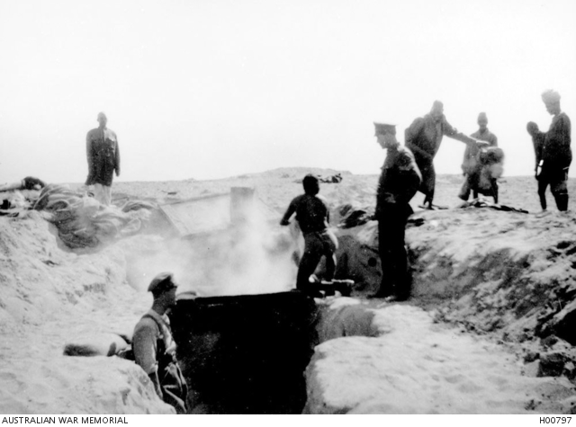 Members of a hygiene unit in the process of disinfecting clothes as a ...