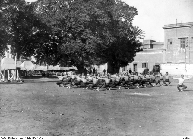 An instructor (right) leading a group of convalescents in physical ...