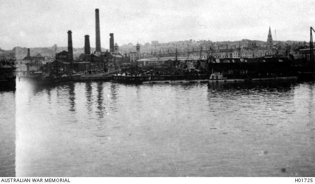 PLYMOUTH, ENGLAND. 1919. VIEW OF A HARBOUR WHARF WITH A GERMAN ...