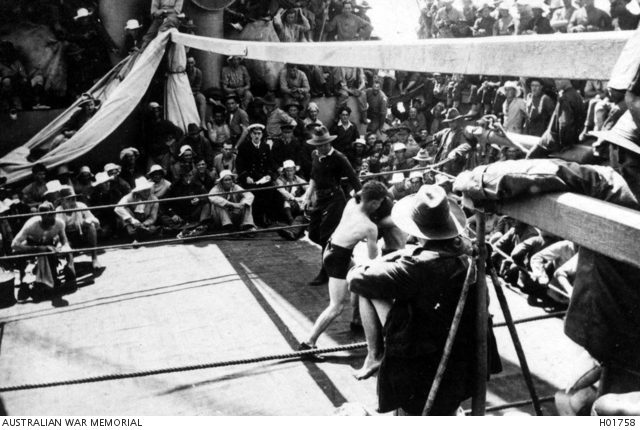 AT SEA. 1919. THE FIRST OF MANY BOXING CONTESTS ON HMAS TAKADA DURING ...
