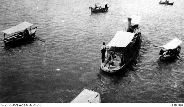 PORT SAID, EGYPT. 1919. NATIVE BOATS ALONGSIDE HMAT TAKADA ...