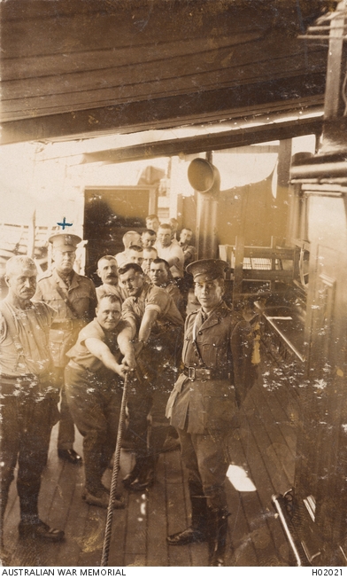 AT SEA. A TEAM IN A TUG OF WAR ABOARD THE TROOPSHIP SS KYARRA. (DONOR M ...