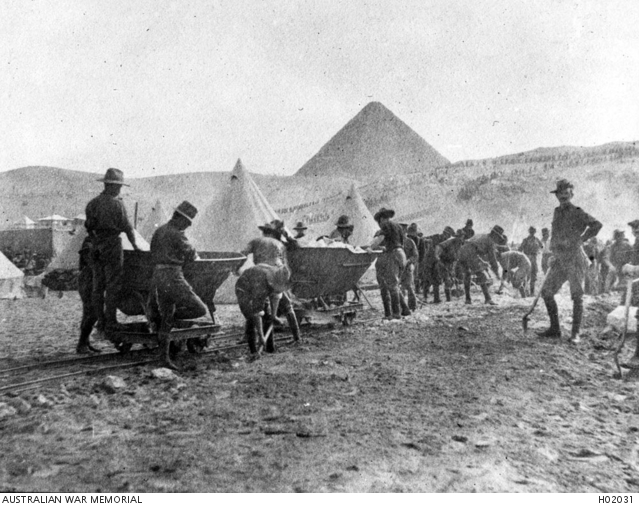 Australian troops engaged in making a road in the desert area near the ...