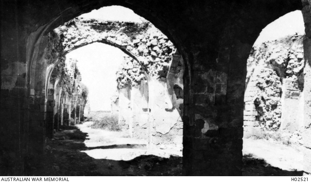 RAMLEH, PALESTINE. C. 1917. STONE ARCHES IN THE REMAINS OF AN ANCIENT ...