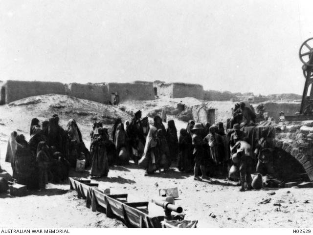 GAZA AREA. C. 1917. WATER BEING DISTRIBUTED TO NATIVES AT BENI SELA ...