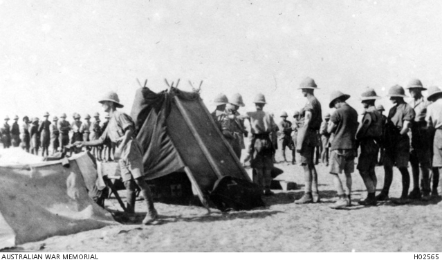 PALESTINE, C. 1918. INOCULATION PARADE AT AN IMPROVISED REGIMENTAL AID ...