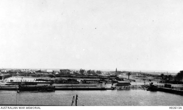 Kantara, Egypt. c. 1918. The Suez Canal shoreline with the town in the ...