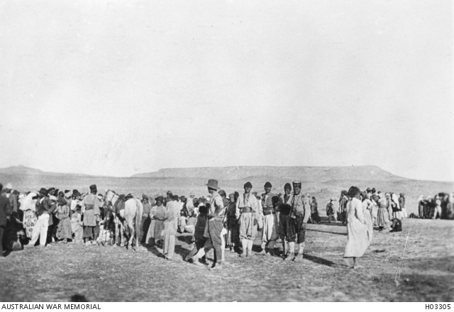 Kurdistan, Persia. 1914-08. A halt for the distribution of flour to ...
