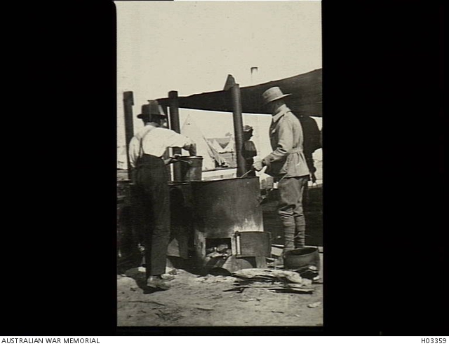 Liverpool, NSW. c. 1914. The Army camp cookhouse preparing a meal with ...