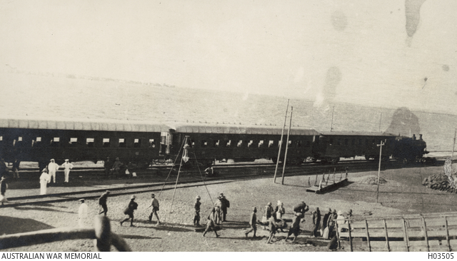 Indian stretcher bearers carrying troops on board a hospital train ...