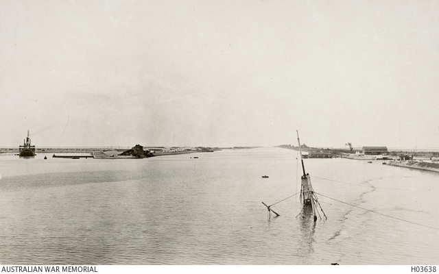 Entrance to the Suez Canal with a ship sunk in the fairway ...
