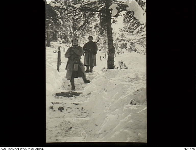 Alsace, France. c. 1917. Two French soldiers outside the entrance to a ...