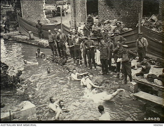 France. c. 1917. Canadian Army soldiers enjoying a swim in a pool made ...