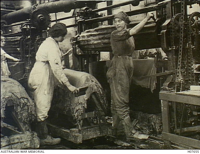 Nottingham, England. Three women war workers at a tannery working with ...