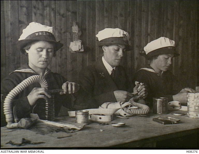 England. Three members of the Womens Royal Naval Service (WRNS) at work ...