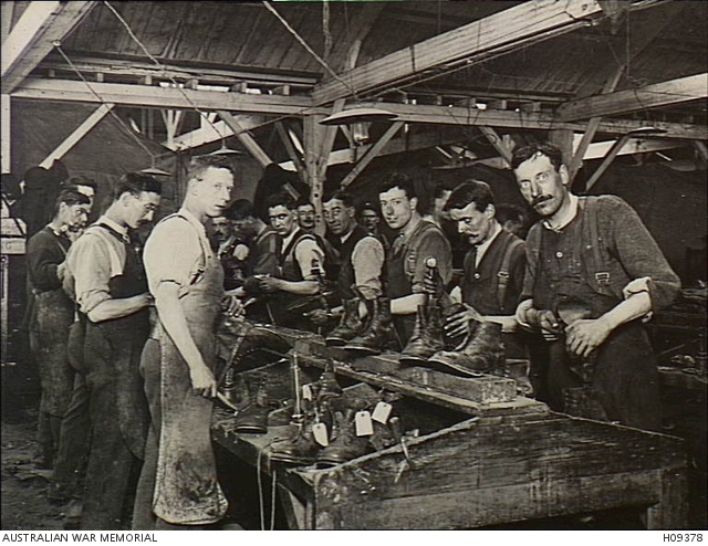 Calais, France. c. 1917. British bootmakers at work renovating up to ...