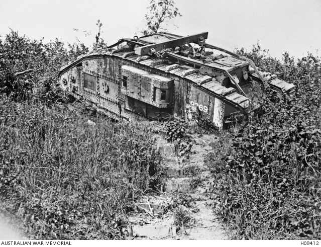 Chipilly, France. c. 1917. A British Army tank moving forward to clear ...