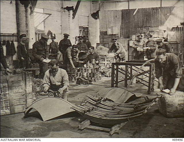 Rouen, France. c. 1917. British Army soldiers packing motor transport ...