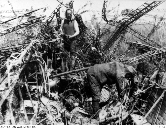 SEARCHING THE GONDOLA OF THE ZEPPELIN BROUGHT DOWN BY NAVAL GUNFIRE ON ...