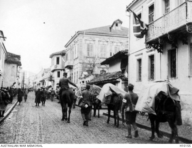 Salonica, Greece. c. 1918. Italian Army pack transport on mules passing ...