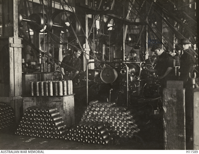 NEWCASTLE, NSW. C. 1917. INTERIOR OF A FACTORY, WITH MEN MANUFACTURING ...