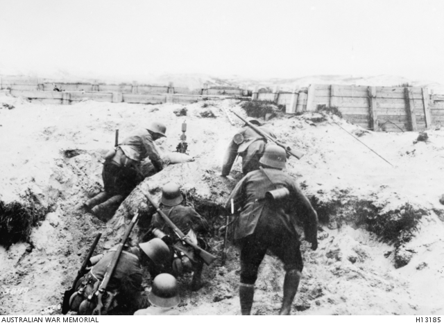 German Marine Corps personnel operating bomb throwers behind cover in ...
